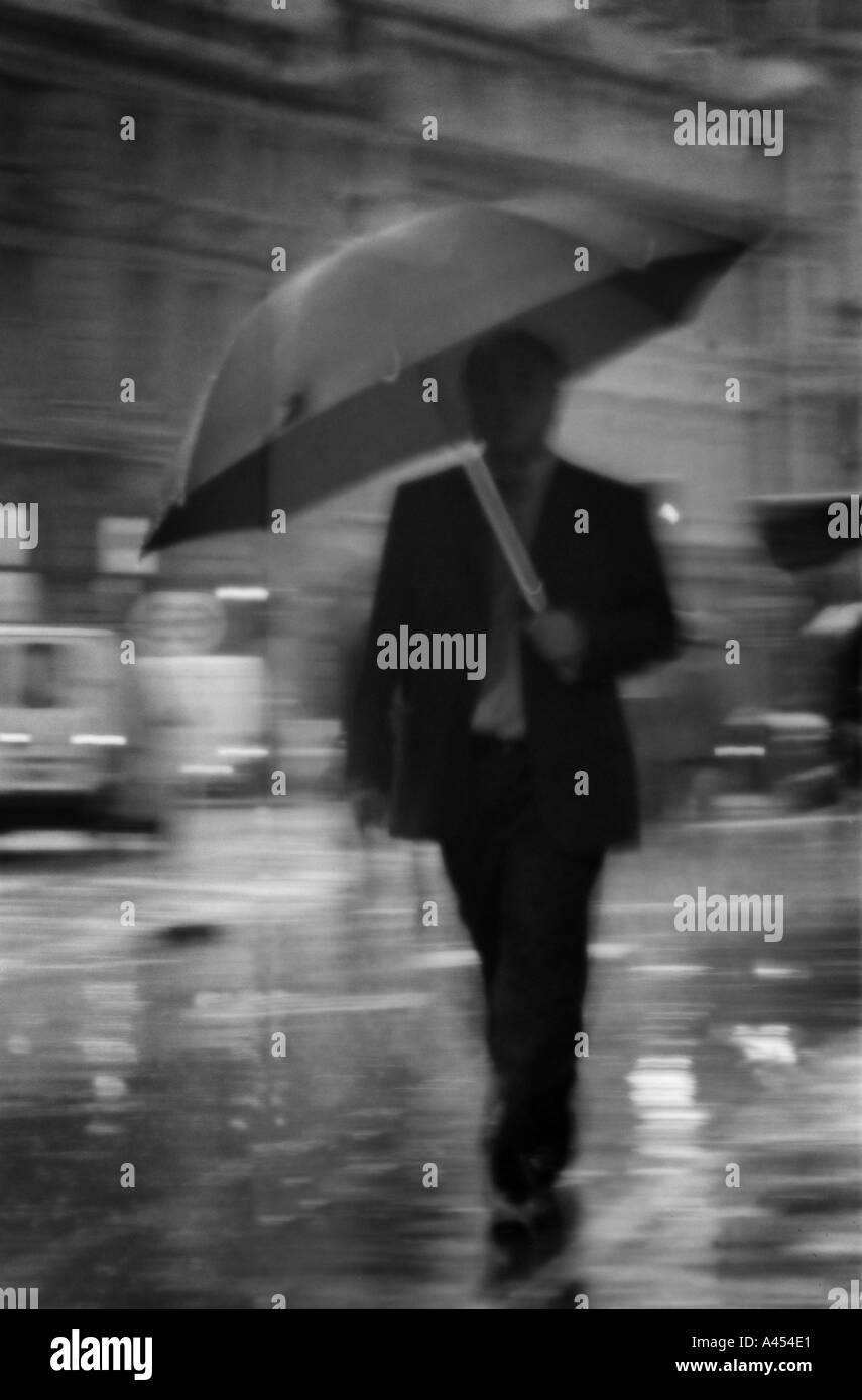 Alone in rain Black and White Stock Photos & Images - Alamy