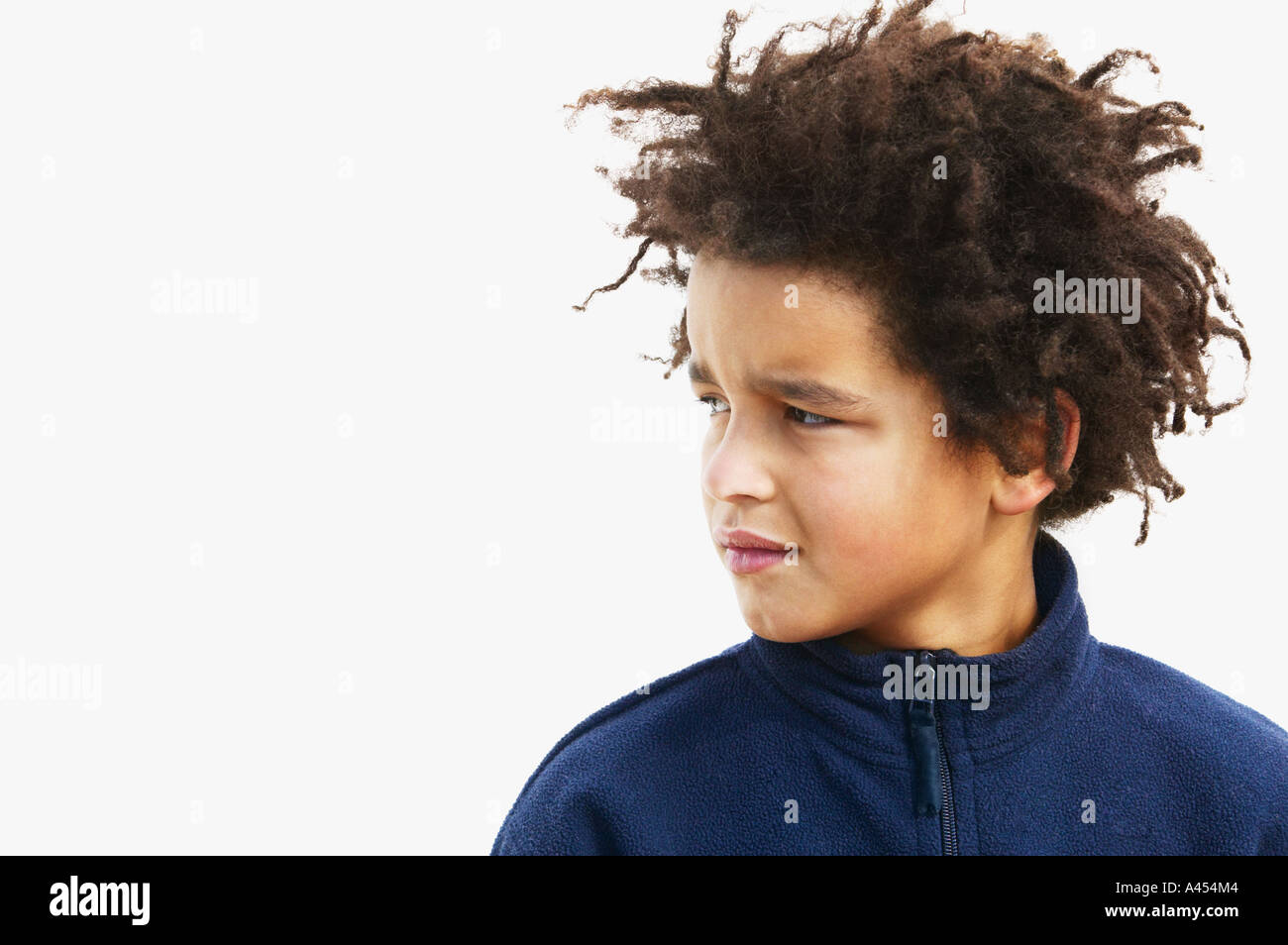 Close up of boy looking sideways Stock Photo - Alamy