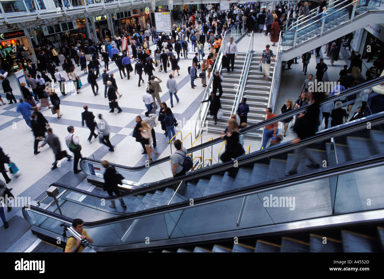 Commuters on stairs and escalator Liverpool Street Station London ...