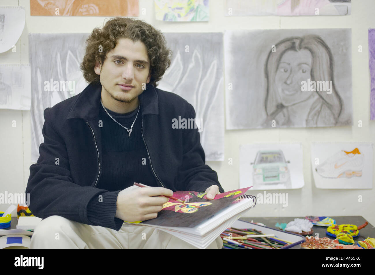 Portrait of teenage boy drawing picture Stock Photo - Alamy