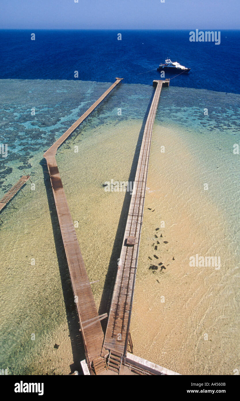 Daedalus Reef (Abu el-Kizan), pier, and dive boat as seen from the 19th ...