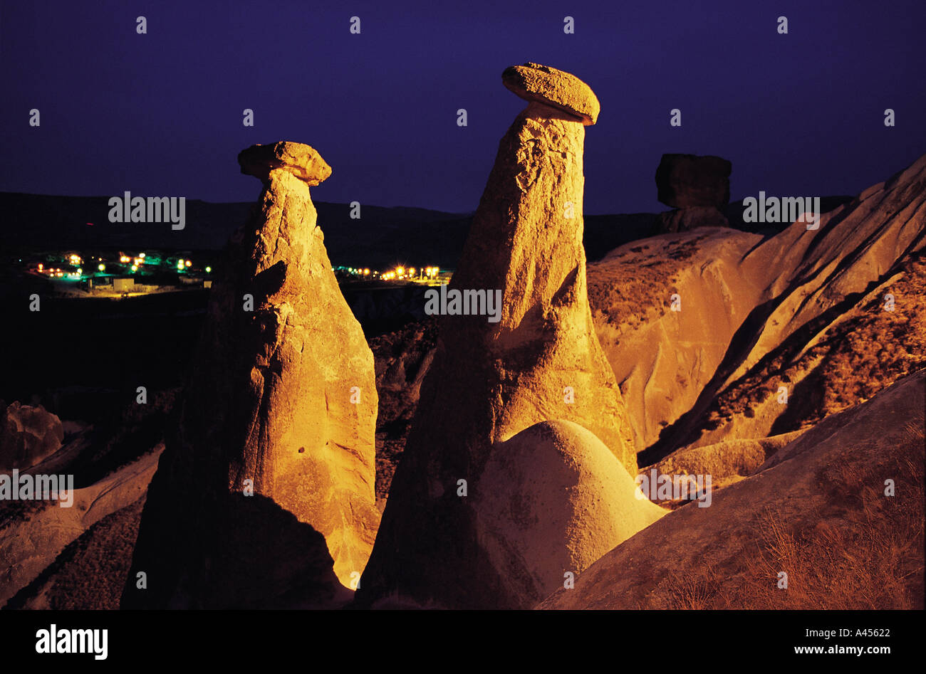 Fairy chimneys called the Three Beauties at night in Urgup Cappadocia ...