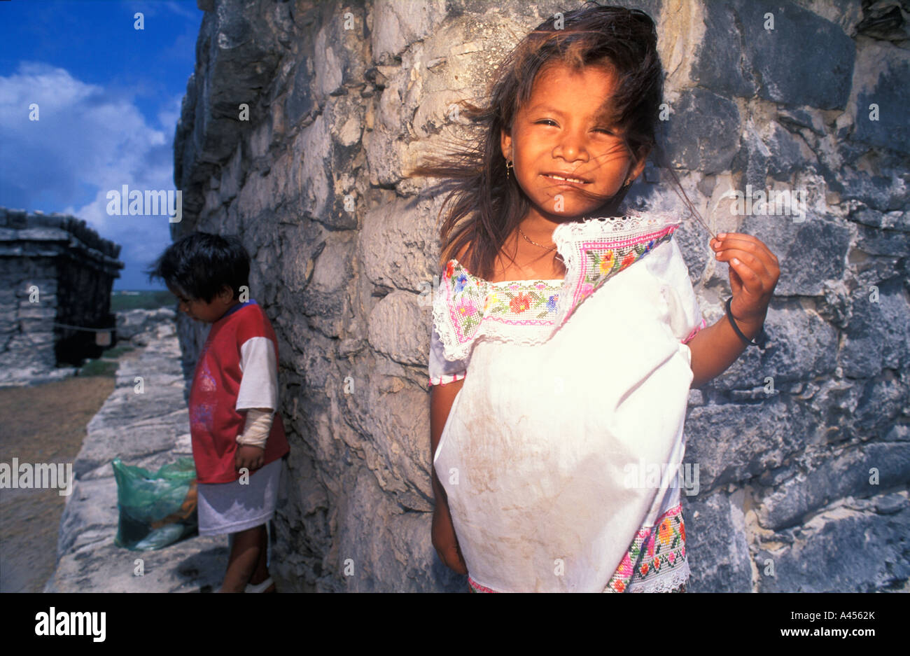 Mayan kids playing in the ruins of Tulum, Quintana Roo. Mexico Stock ...