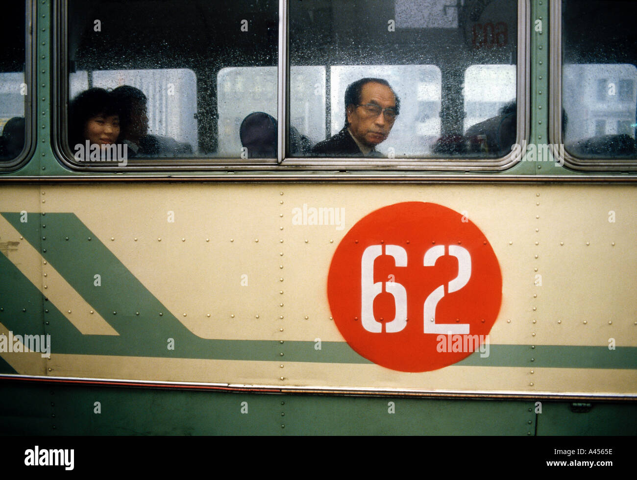 People in a bus in Korea Stock Photo - Alamy
