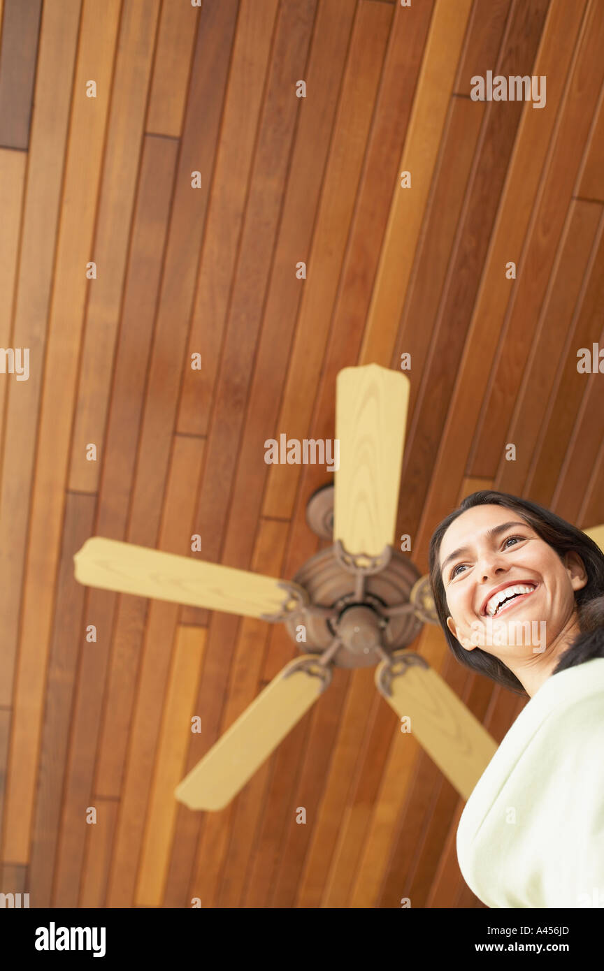 Woman standing with fan hi-res stock photography and images - Alamy