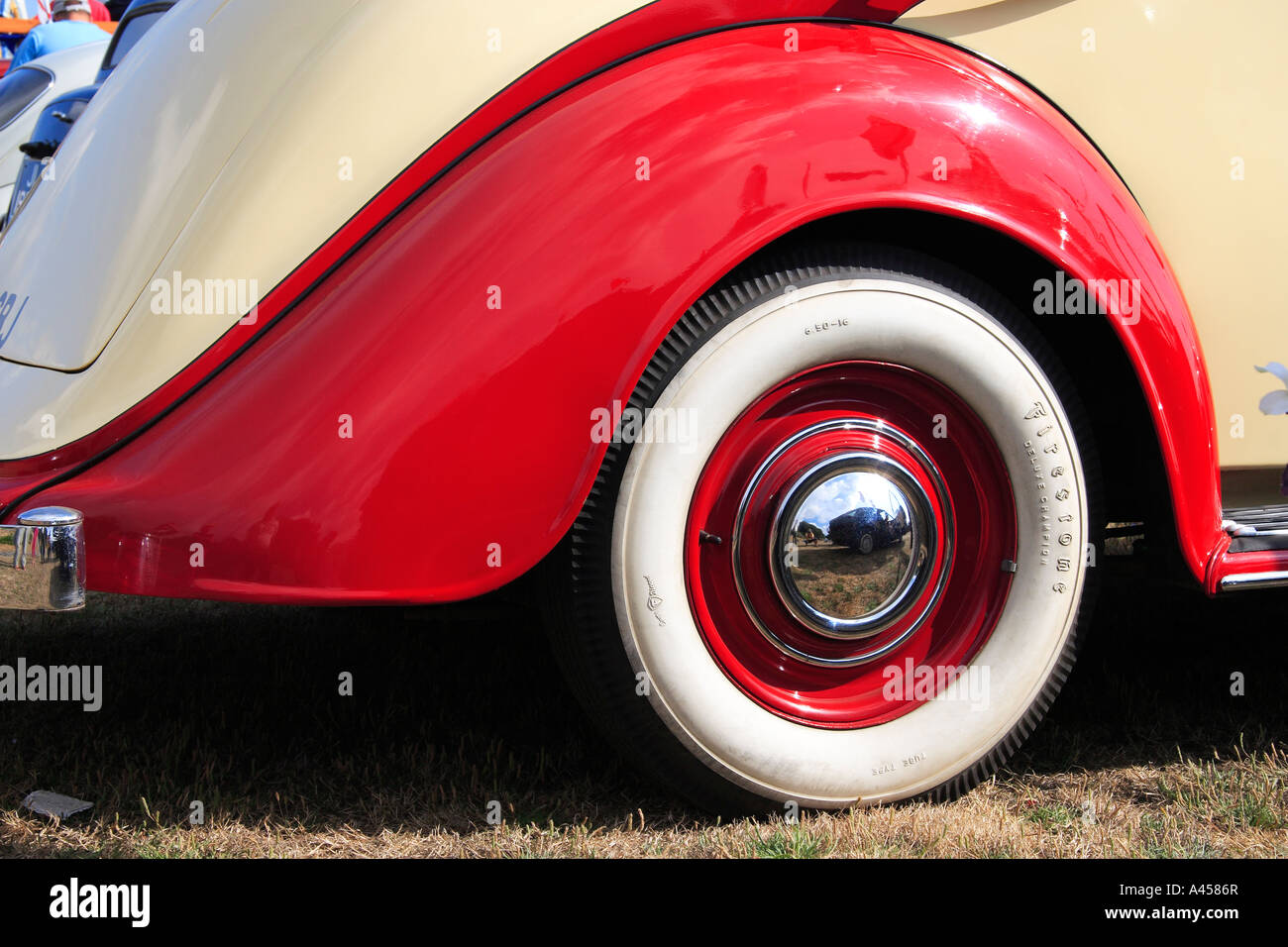 Firestone whitewall tyre wheel arch of vintage car Stock Photo - Alamy