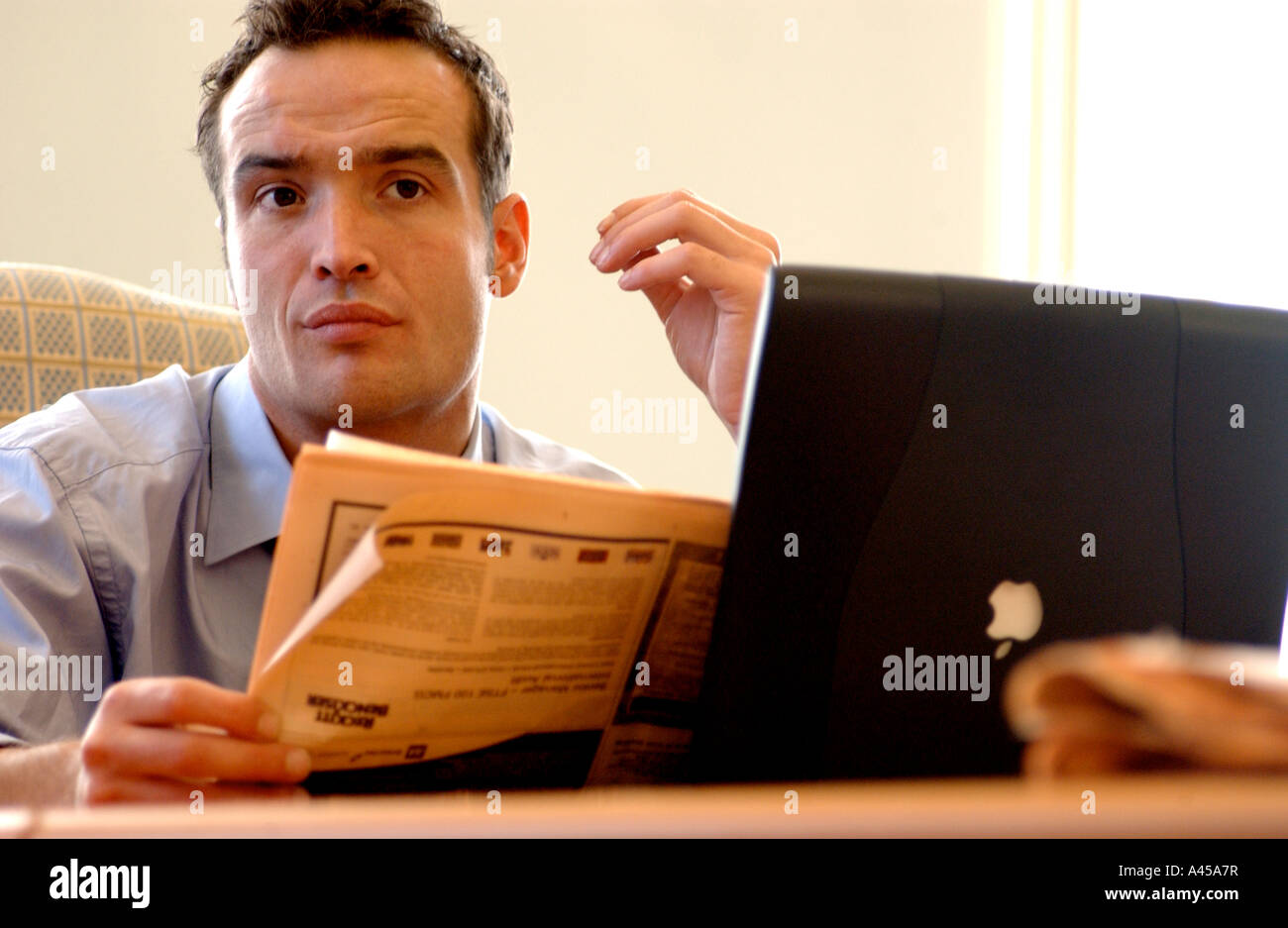 Royalty free photograph of British business man reading financial times ...