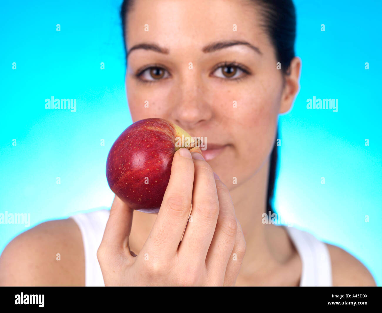 Young Woman Eating an Apple Model Released Stock Photo - Alamy