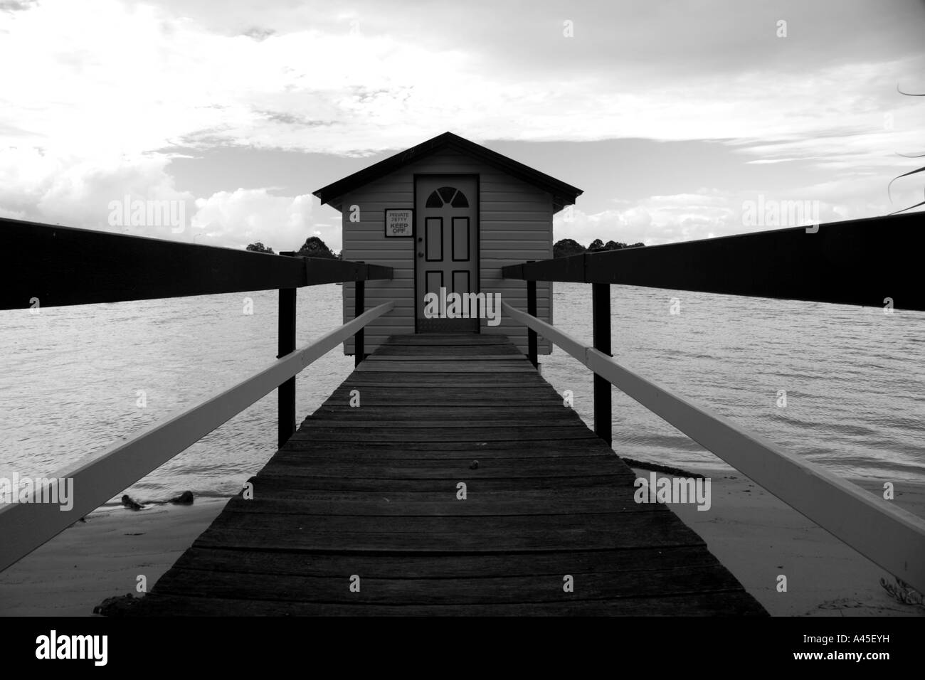 Small boat jetty Stock Photo - Alamy