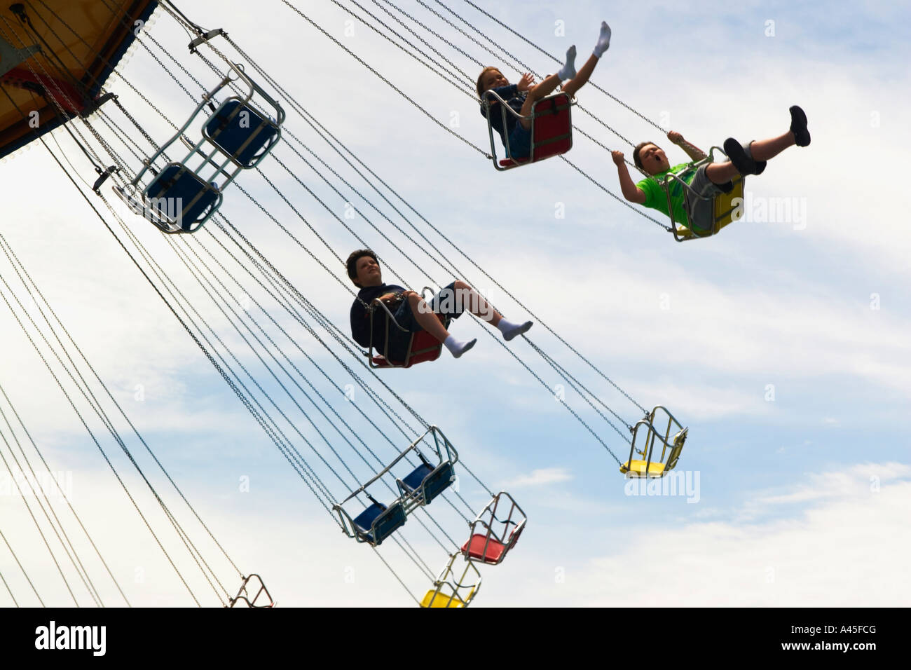 Swings in motion Stock Photo - Alamy