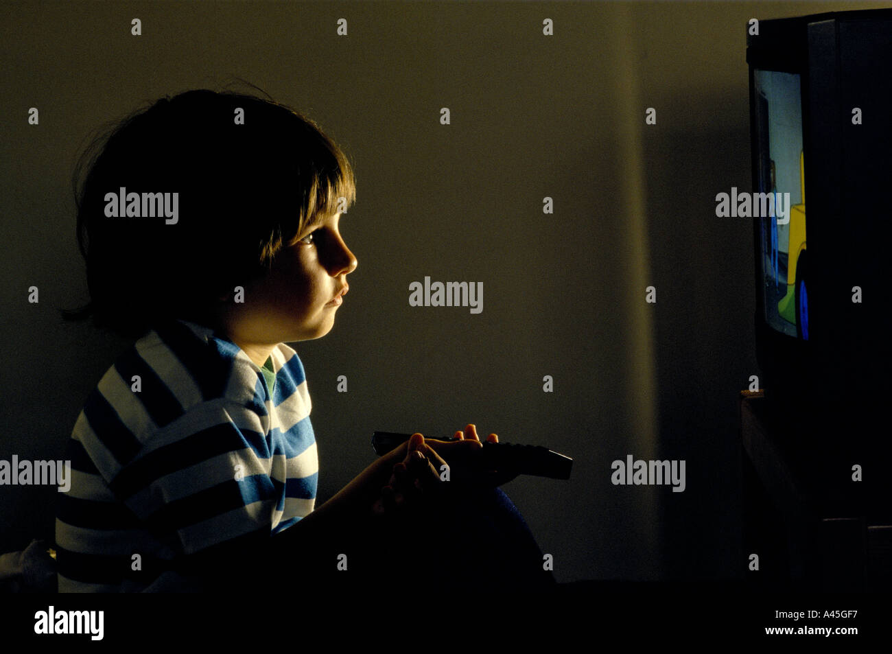 5 year old child watching tv 1993 Stock Photo - Alamy