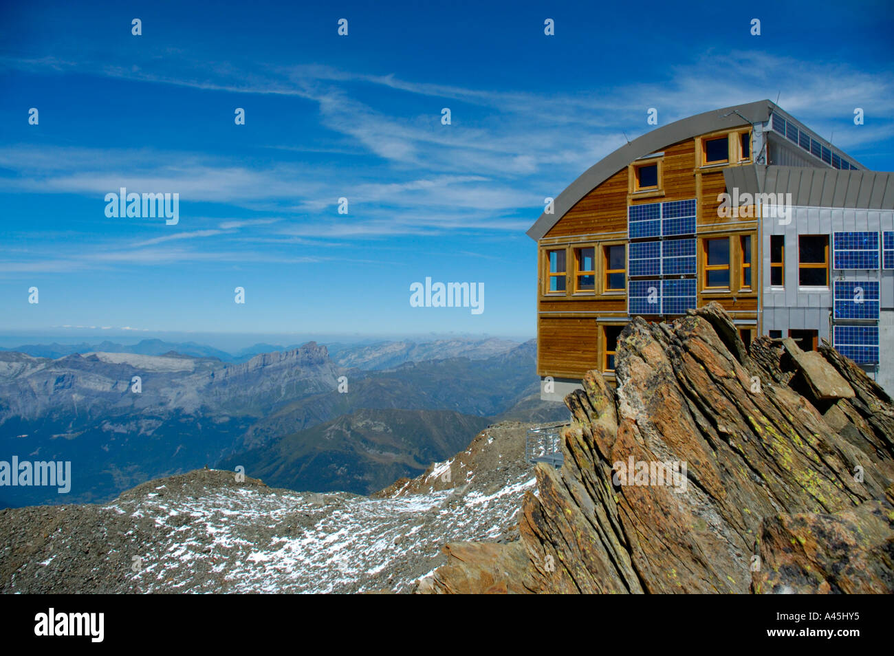 Modern mountain hut Refuge de Tete Rousse at the ascent of Mt. Blanc ...