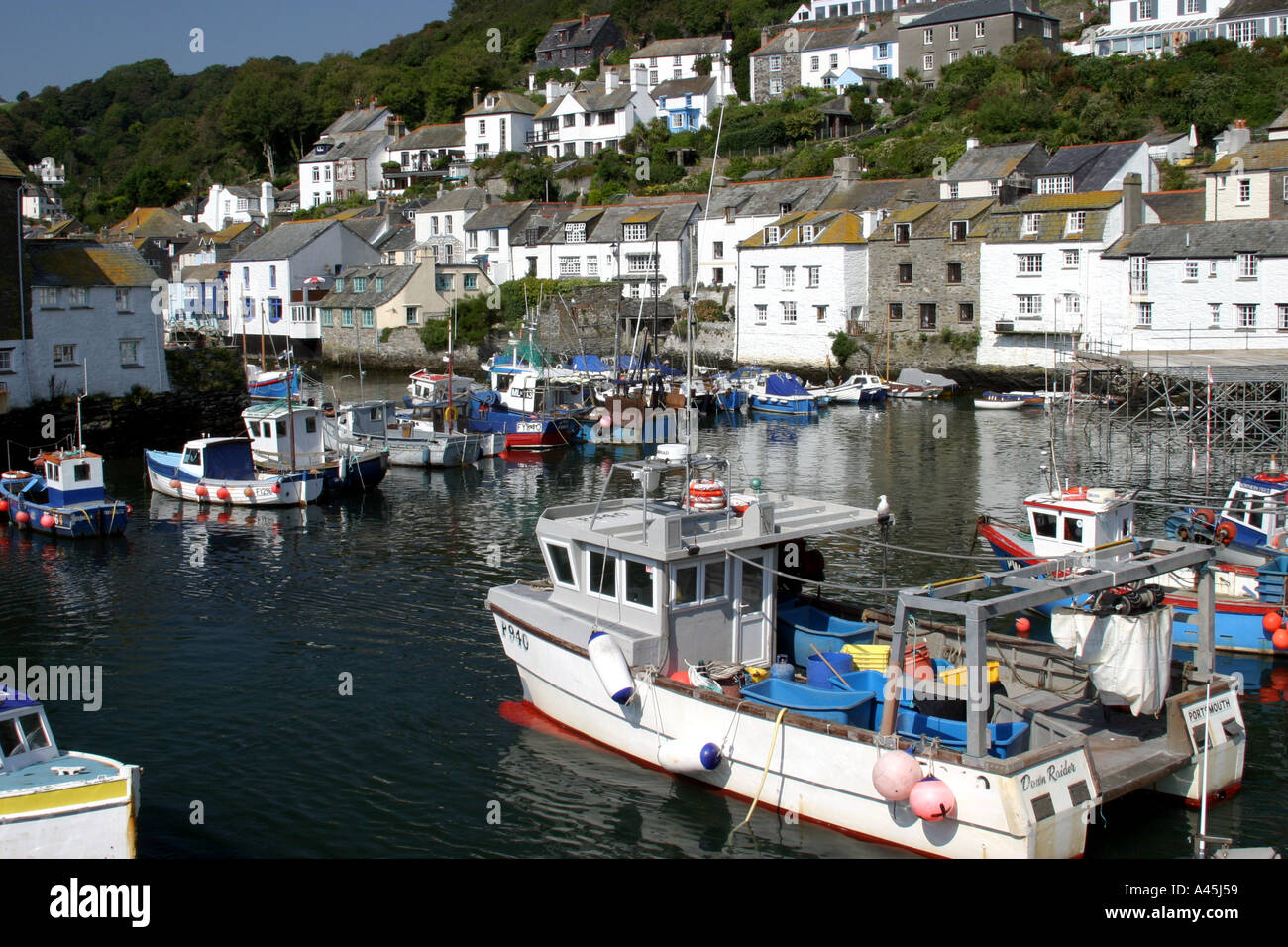 Polperro harbour with fishing boats Stock Photo - Alamy