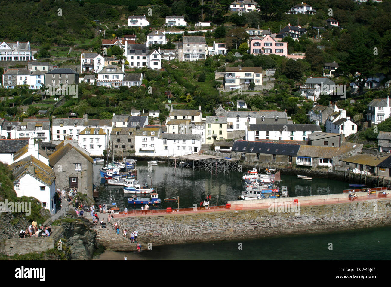 Polperro harbour with fishing boats Stock Photo - Alamy