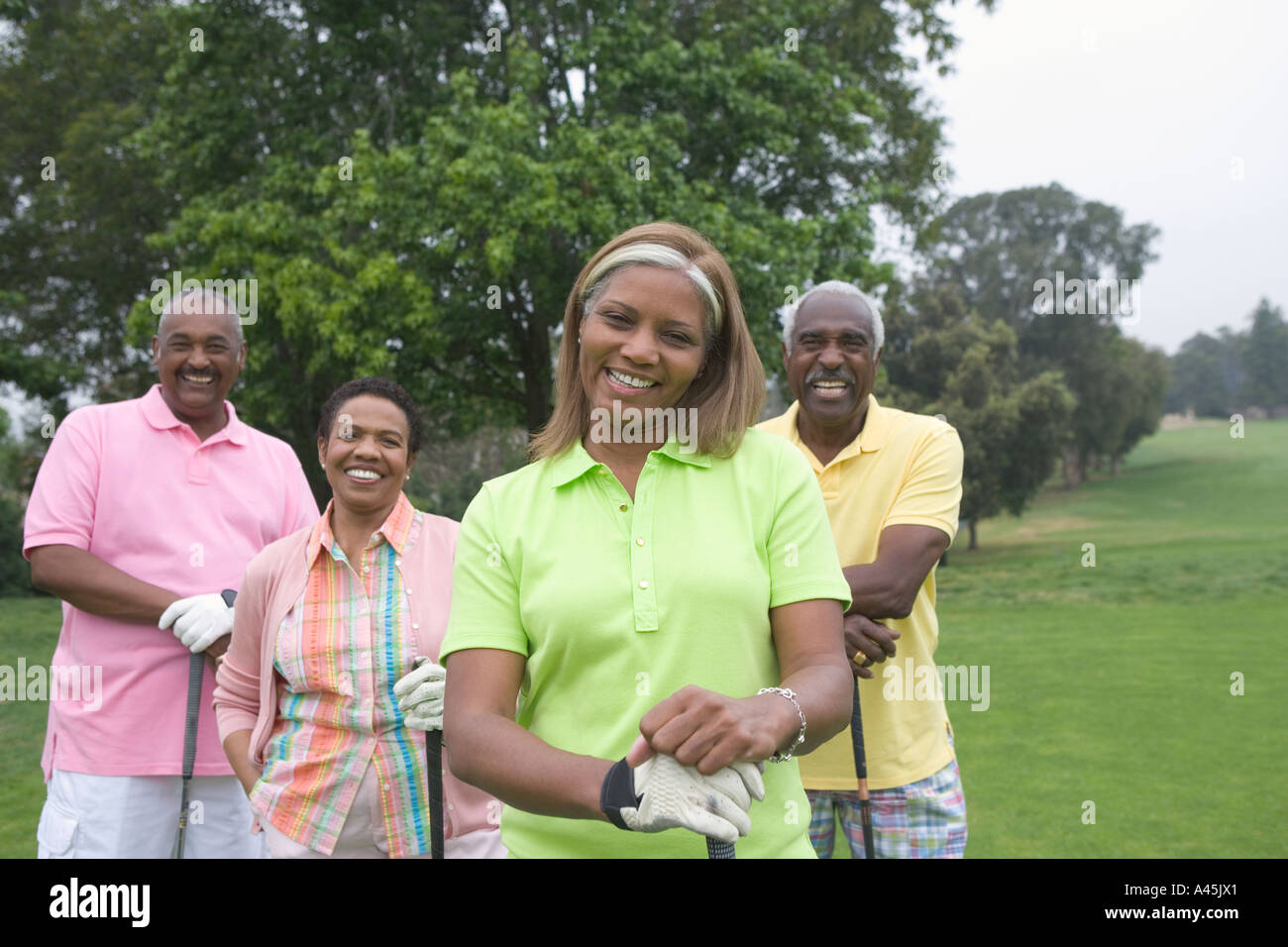 Couples playing golf hi-res stock photography and images - Alamy