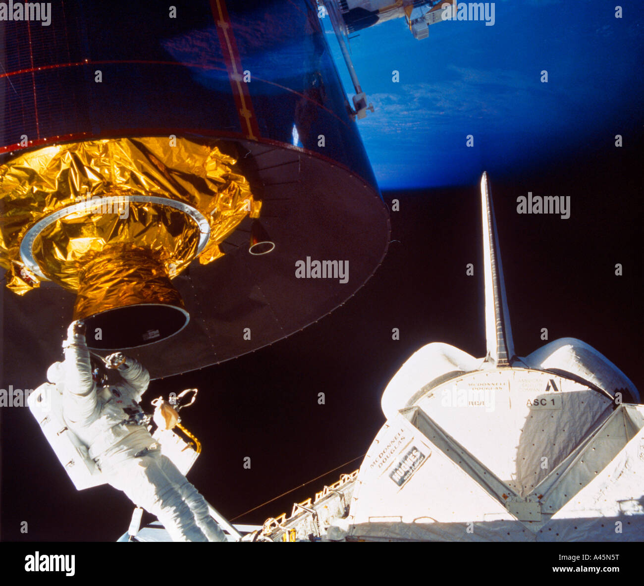 Extravehicular Activity Installing Protective Cover Over Engine Nozzle ...