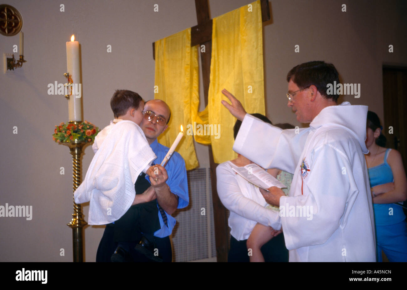 St Joseph's Church Priest Blessing Parents Godparents & Child ...