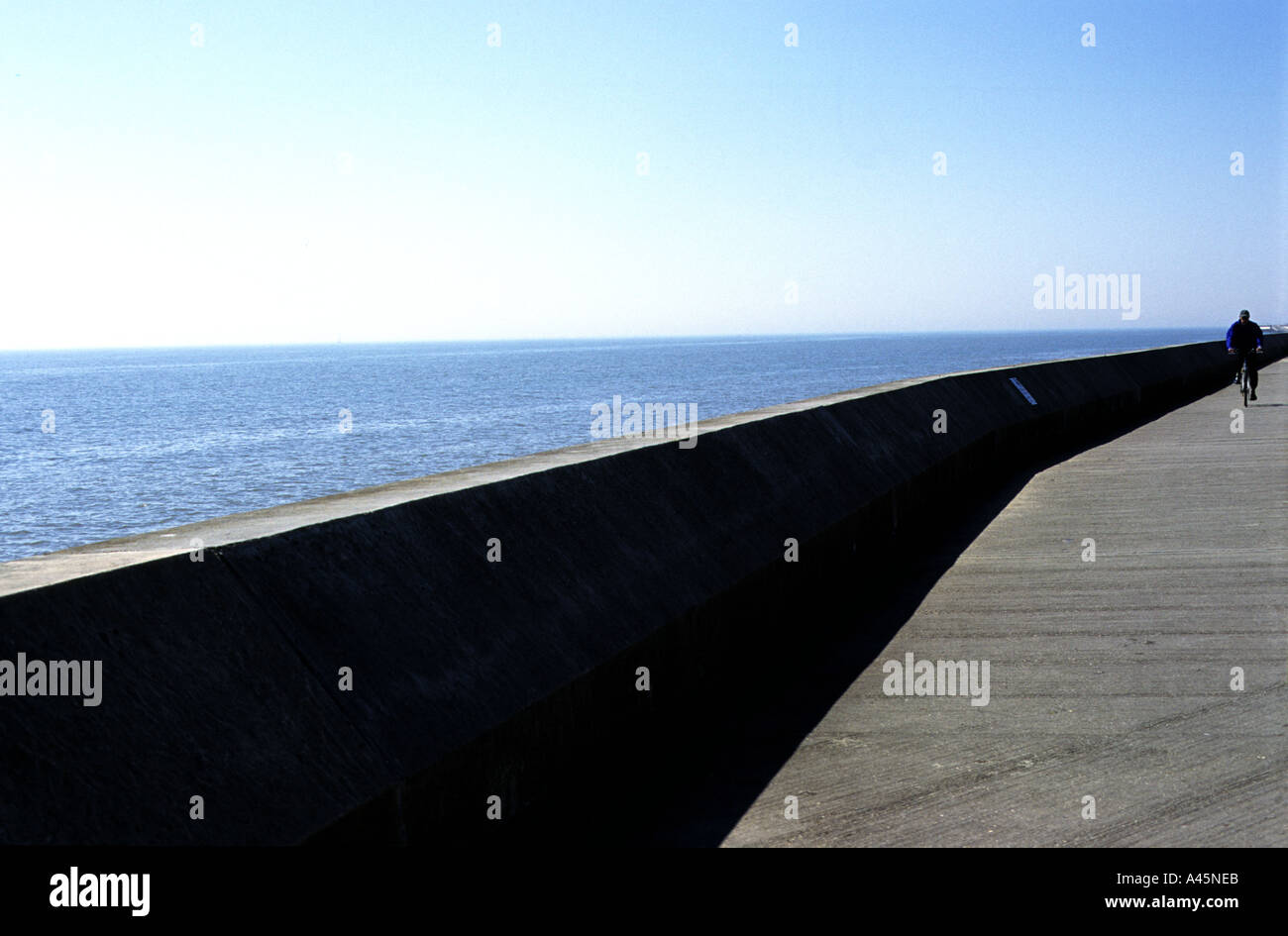 Cyclist on the proposed National Cycle Network at Frinton On Sea Essex ...