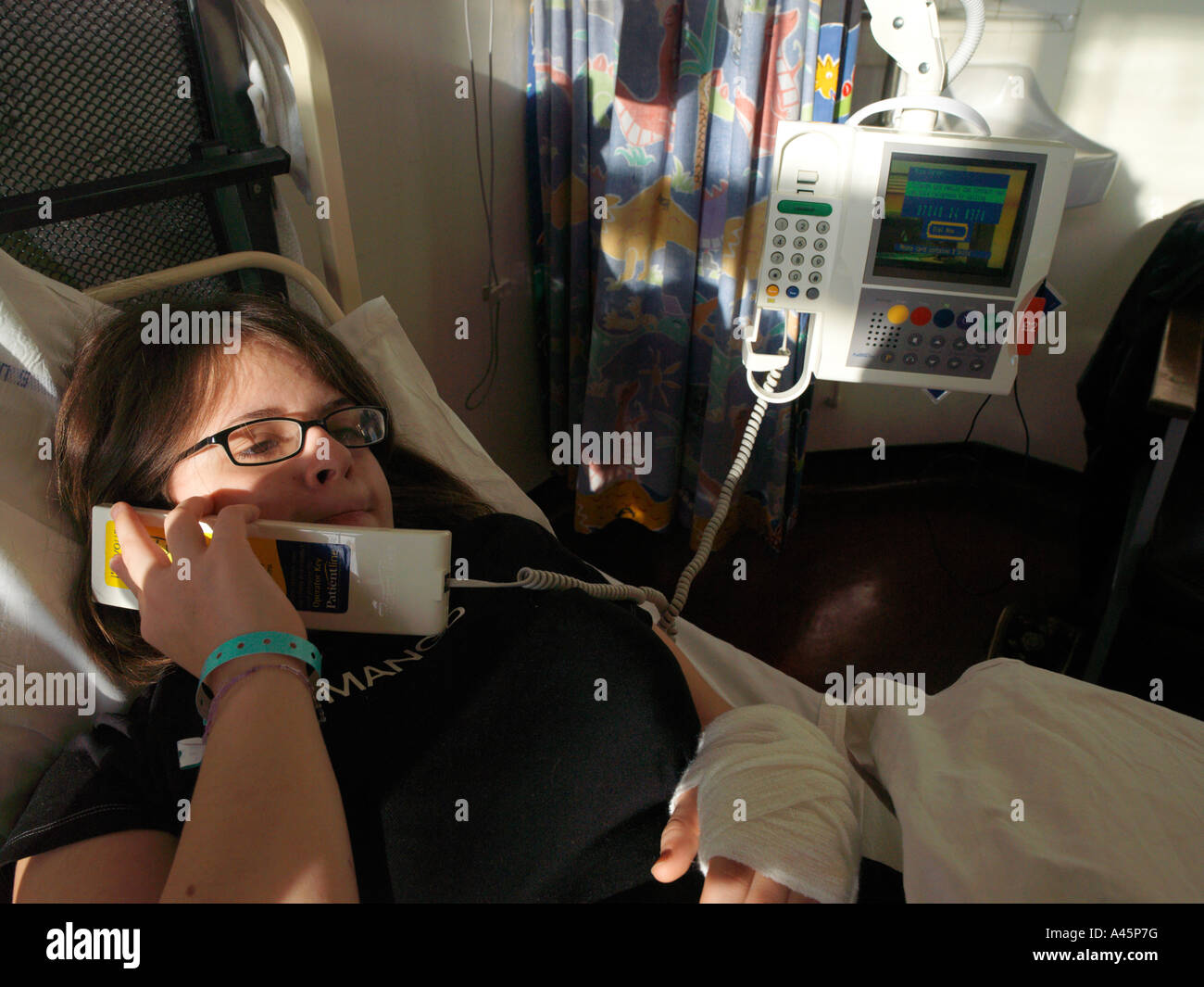 Teenager Using Bedside Telephone Childrens Ward NHS Hospital London ...