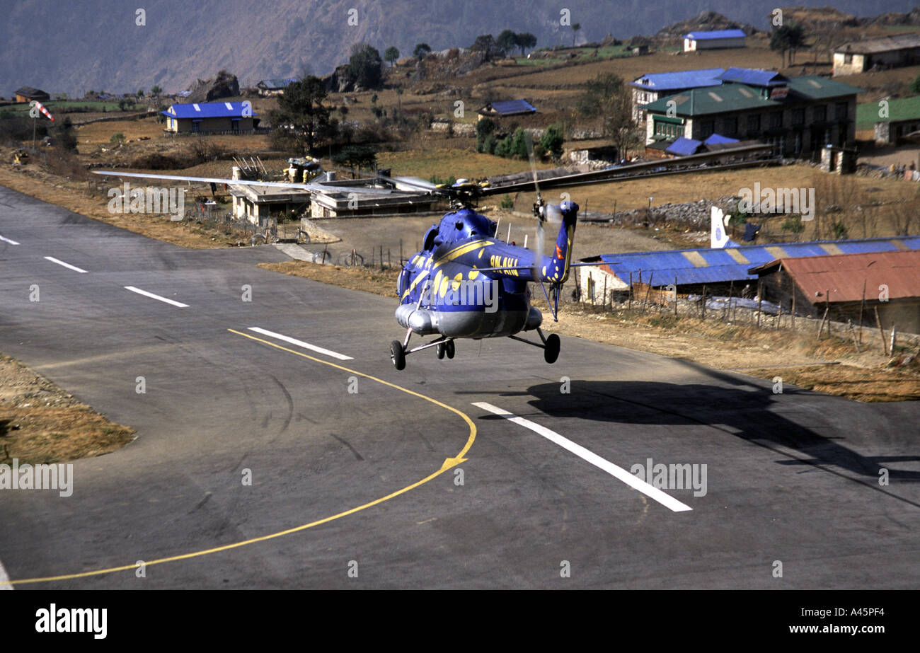 Russian helicopter at Lukla mountain airstrip in the Himalayas Nepal ...