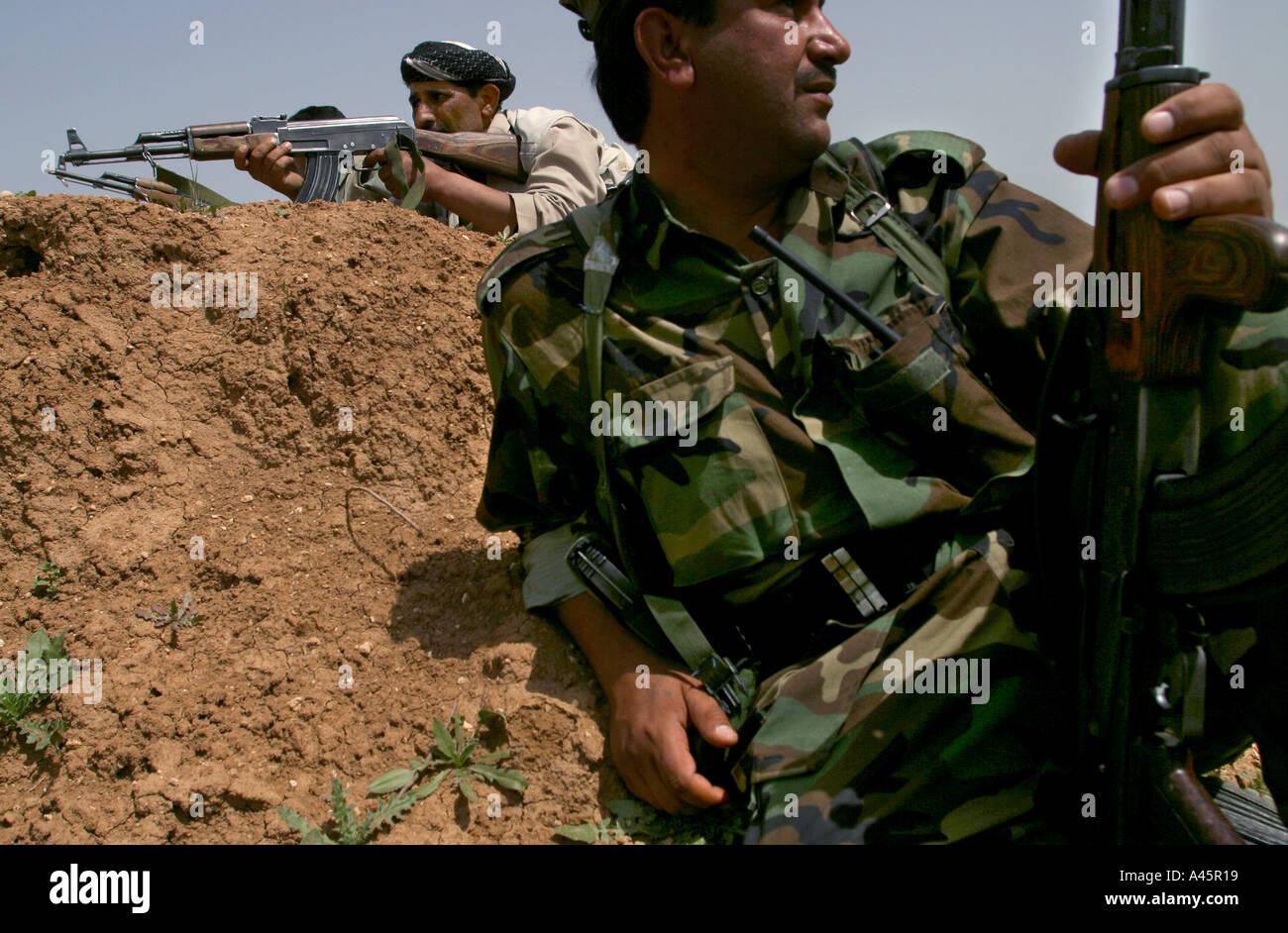 kurdish pershmerga fighters man trenches in the outskirts of khazar ...