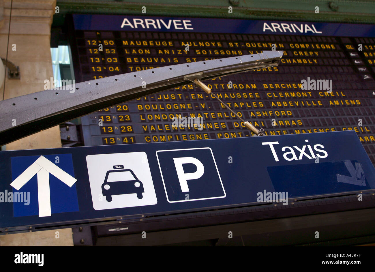 a timetable displays cross channel and european train schedules at the ...