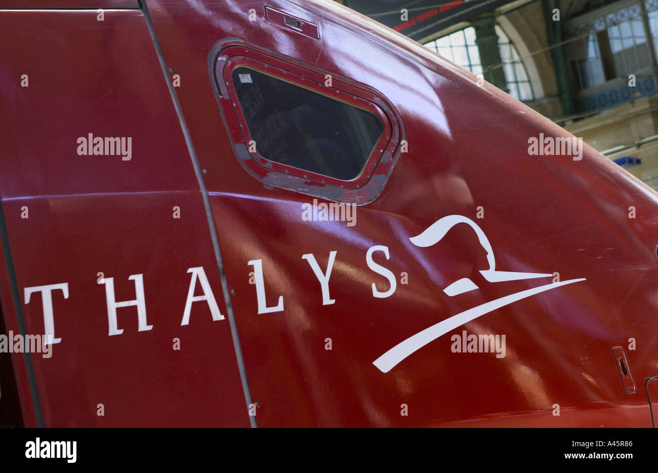 the thalys logo on a trans european train arriving at the gare du nord ...
