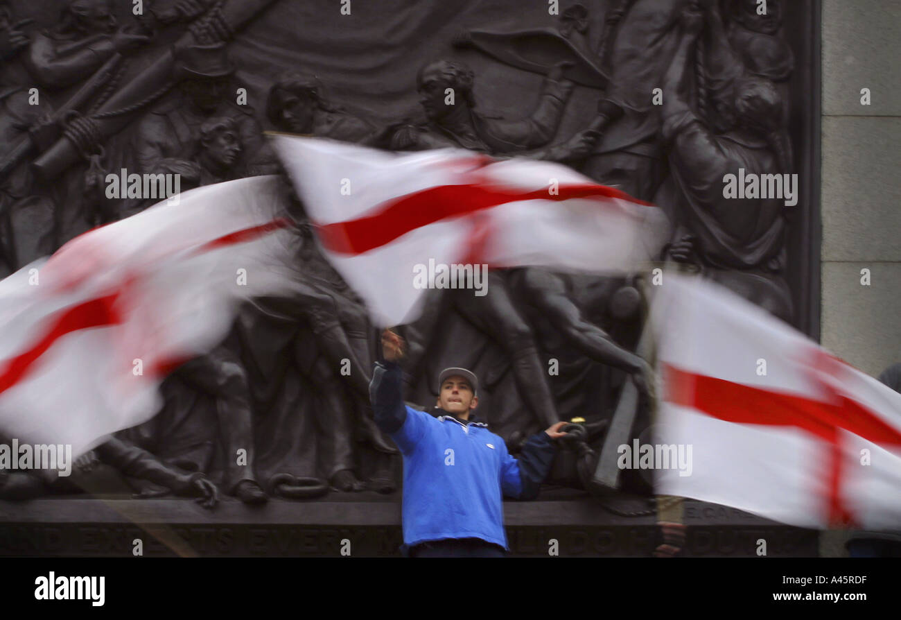 england fan waving flags to celebrate as the england rugby team mark ...
