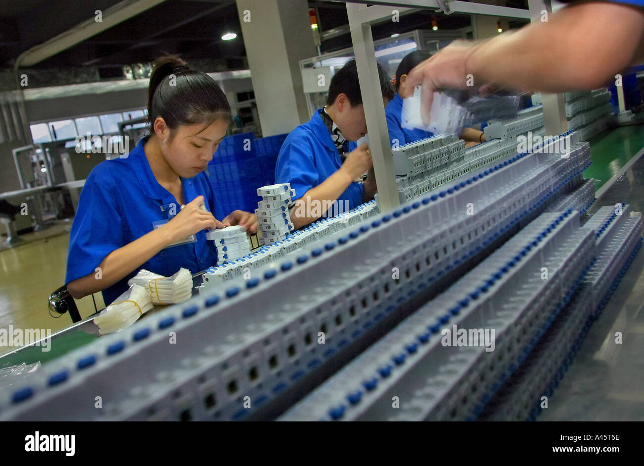 female workers on the assembly line at the chint group low voltage ...