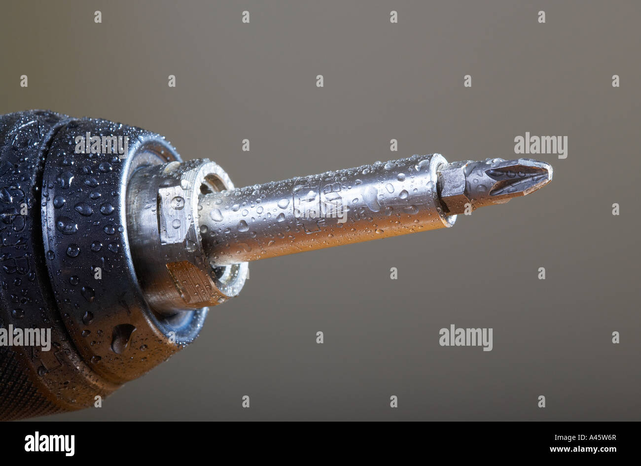 Powerdrill Screwdriver with Water Droplets Stock Photo - Alamy