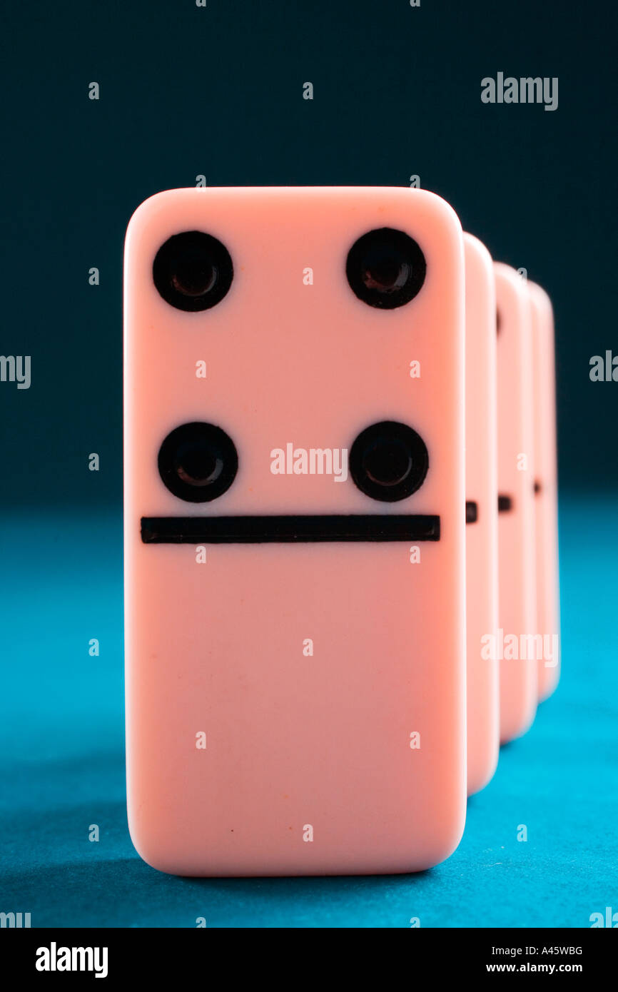 a column of dominoes showing the number four Stock Photo - Alamy