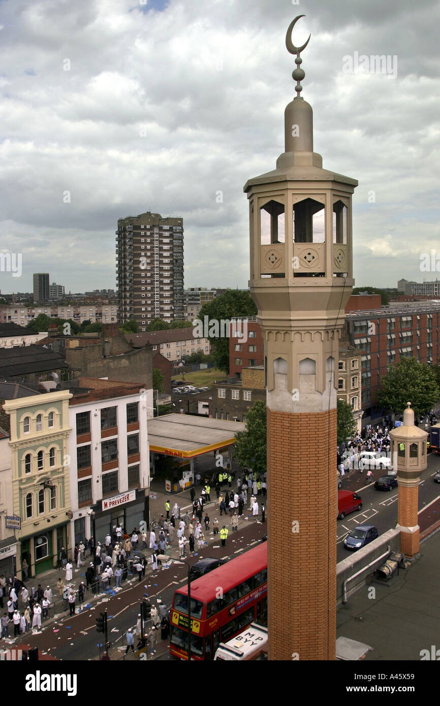 the minaret of the east london mosque is viewed over whitechapel high ...