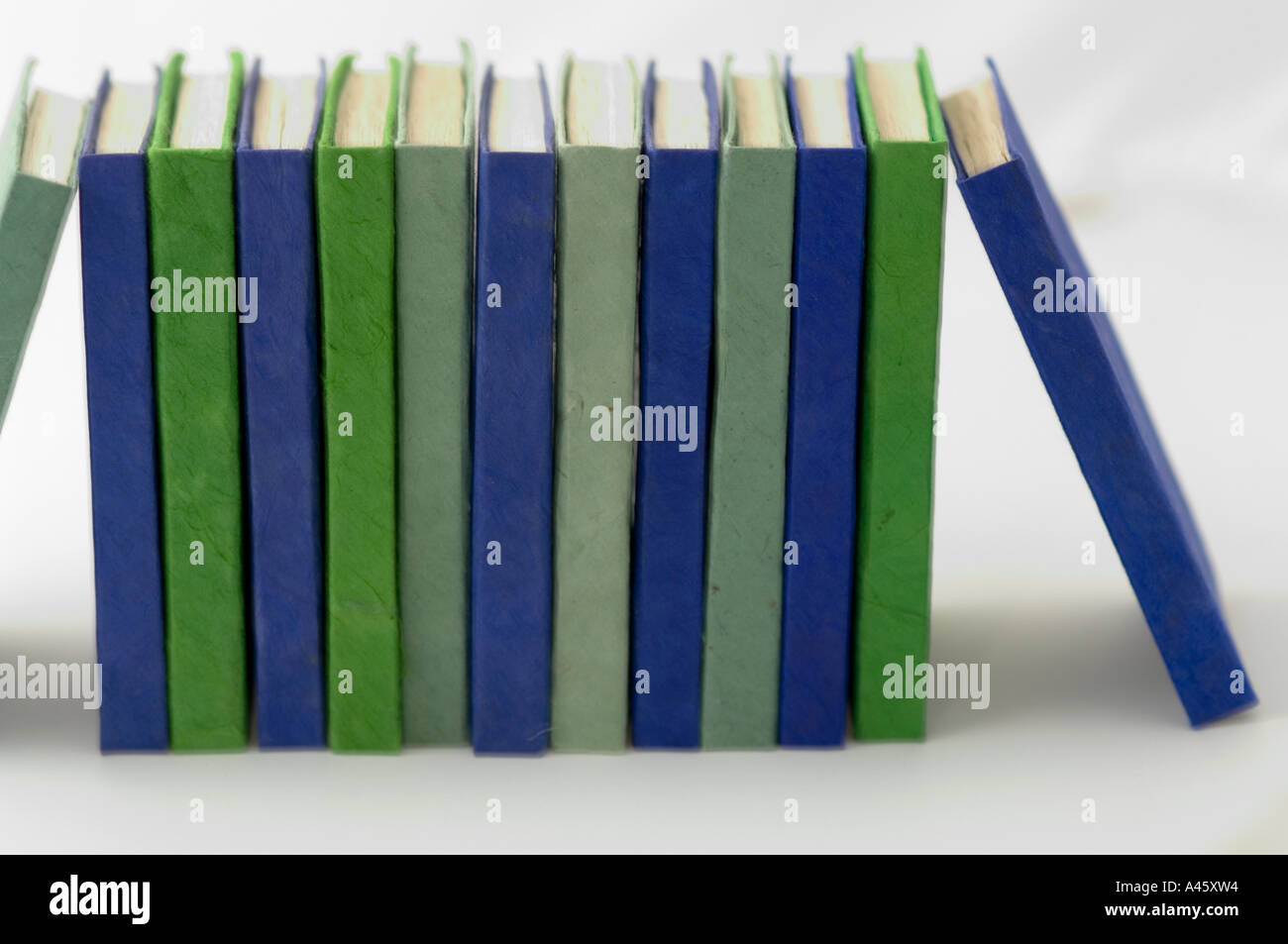 Green and blue booklets Stock Photo - Alamy