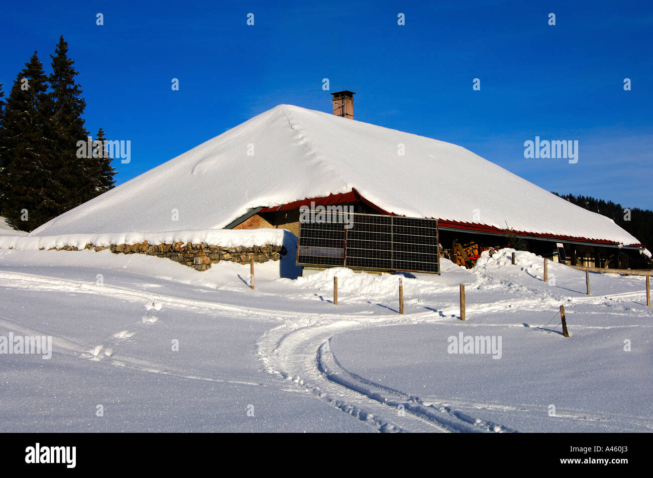 Remote farm house with solar energy panel in the Jura mountains ...