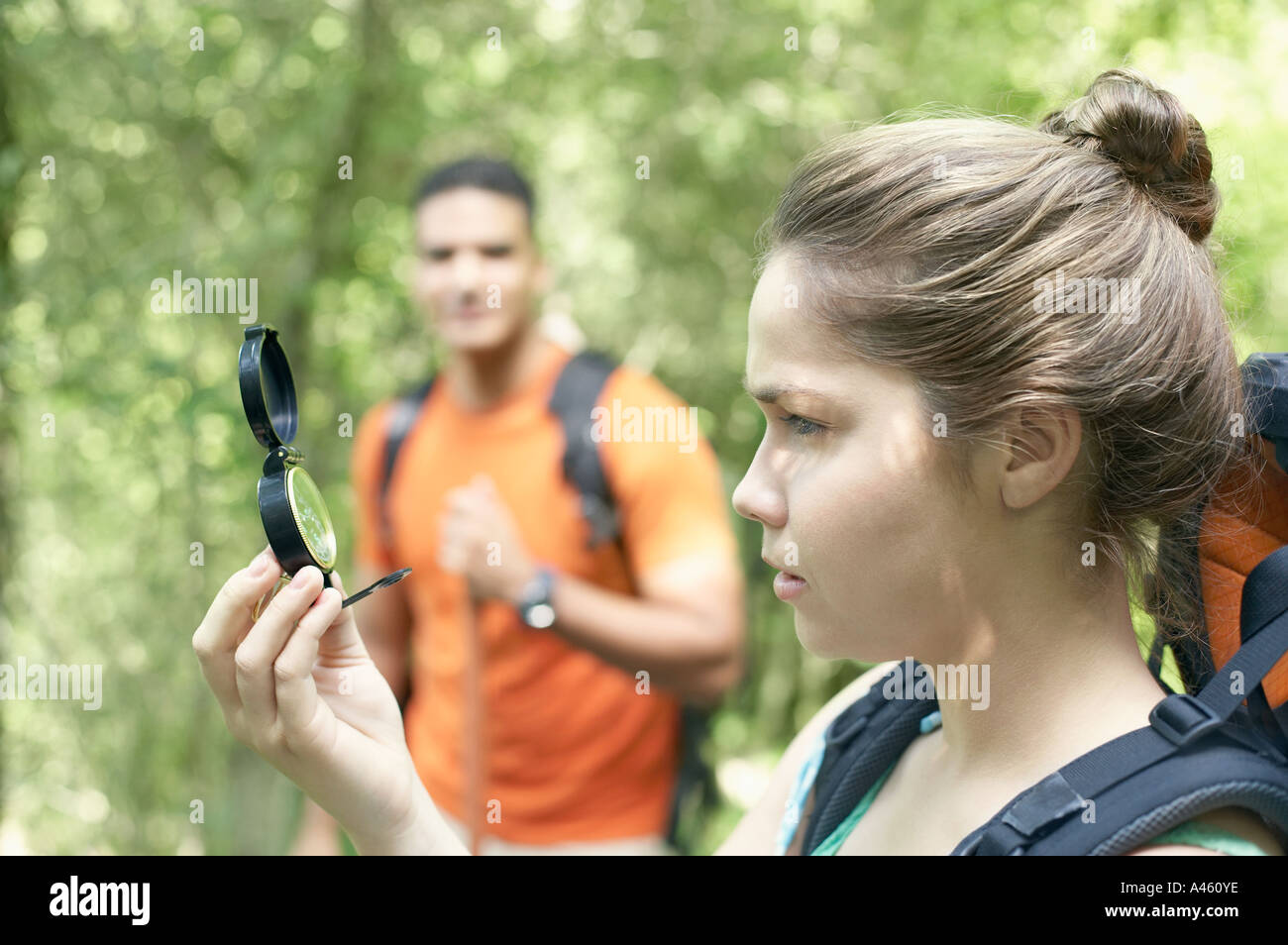 Female hiker using a compass Stock Photo - Alamy Female hiker using a compass Stock Photo - Alamy