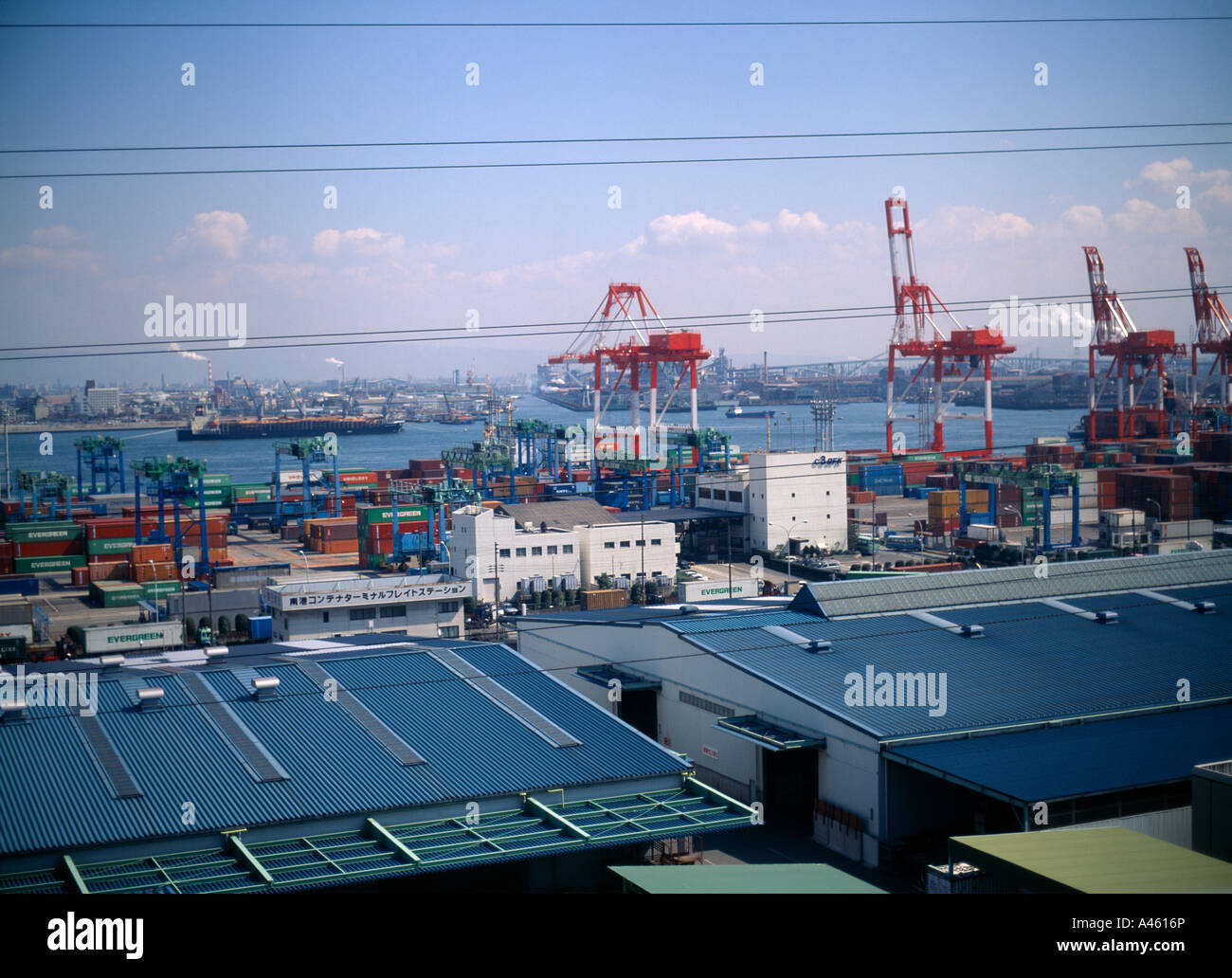 JAPAN Osaka Osaka Bay Aerial view over the docks with warehouses ...