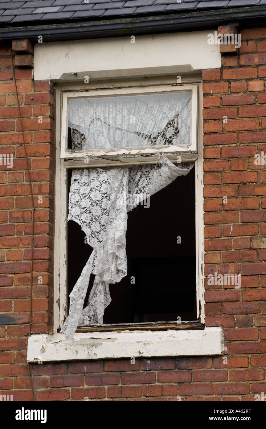 Broken window in a derelict house in Easington Colliery, County Durham ...