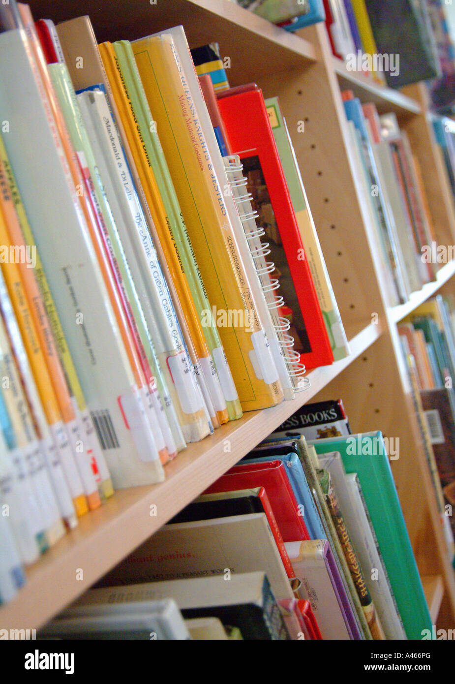 Books on bookshelf in library Stock Photo - Alamy