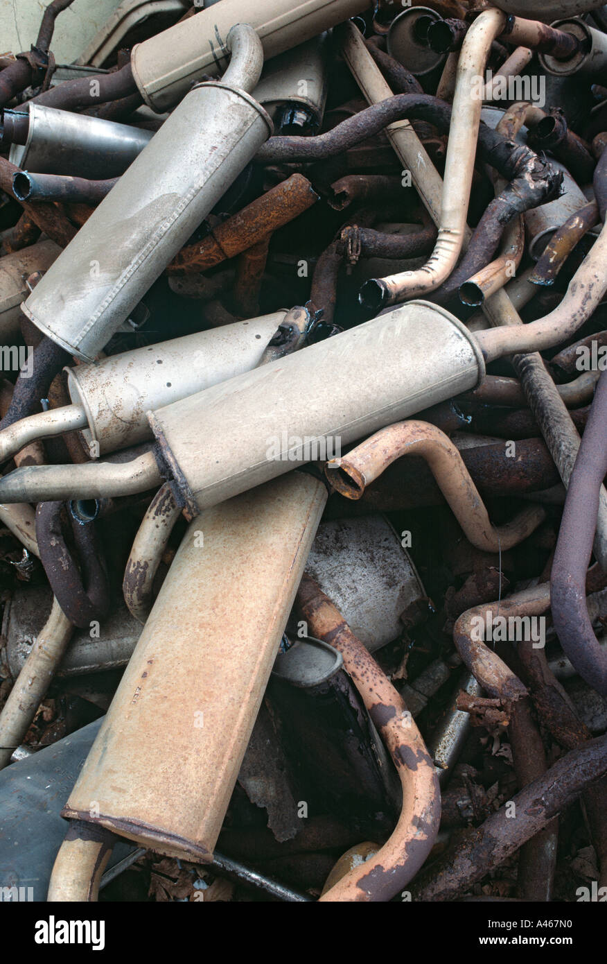 Pile of discarded mufflers Stock Photo - Alamy