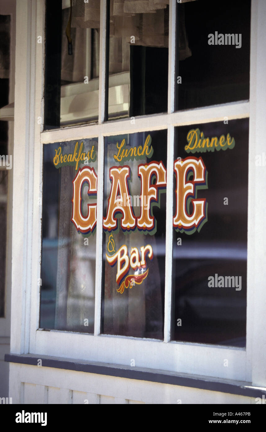Breakfast lunch dinner cafe bar painted on window Stock Photo - Alamy