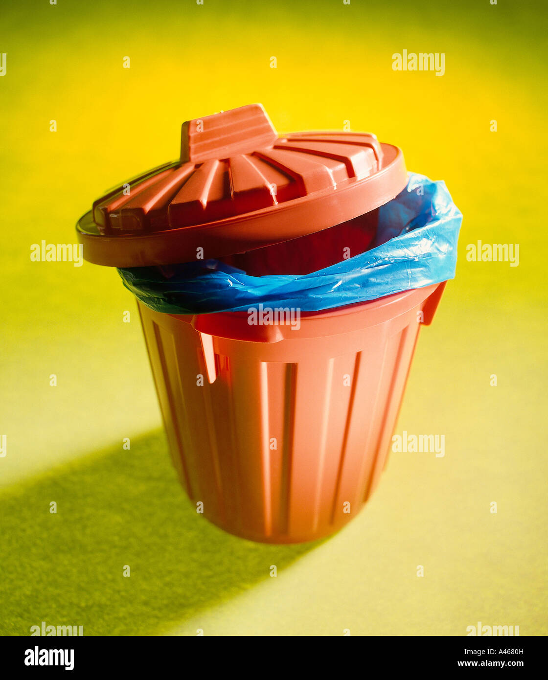 A half opened garbage can Stock Photo - Alamy