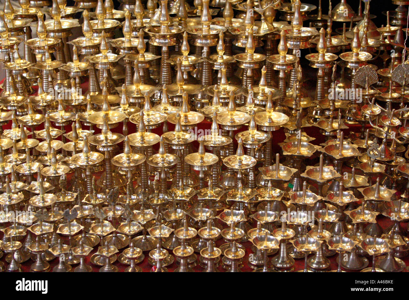 An array of oil lamps - used in kerala Stock Photo - Alamy