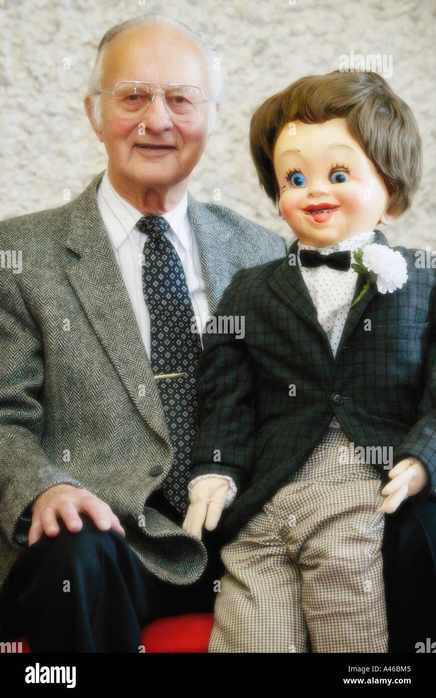 Ventriloquist with puppet Stock Photo - Alamy