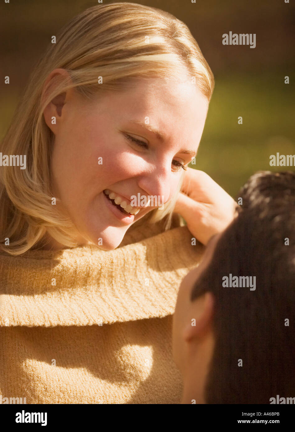Woman looks with love Stock Photo - Alamy