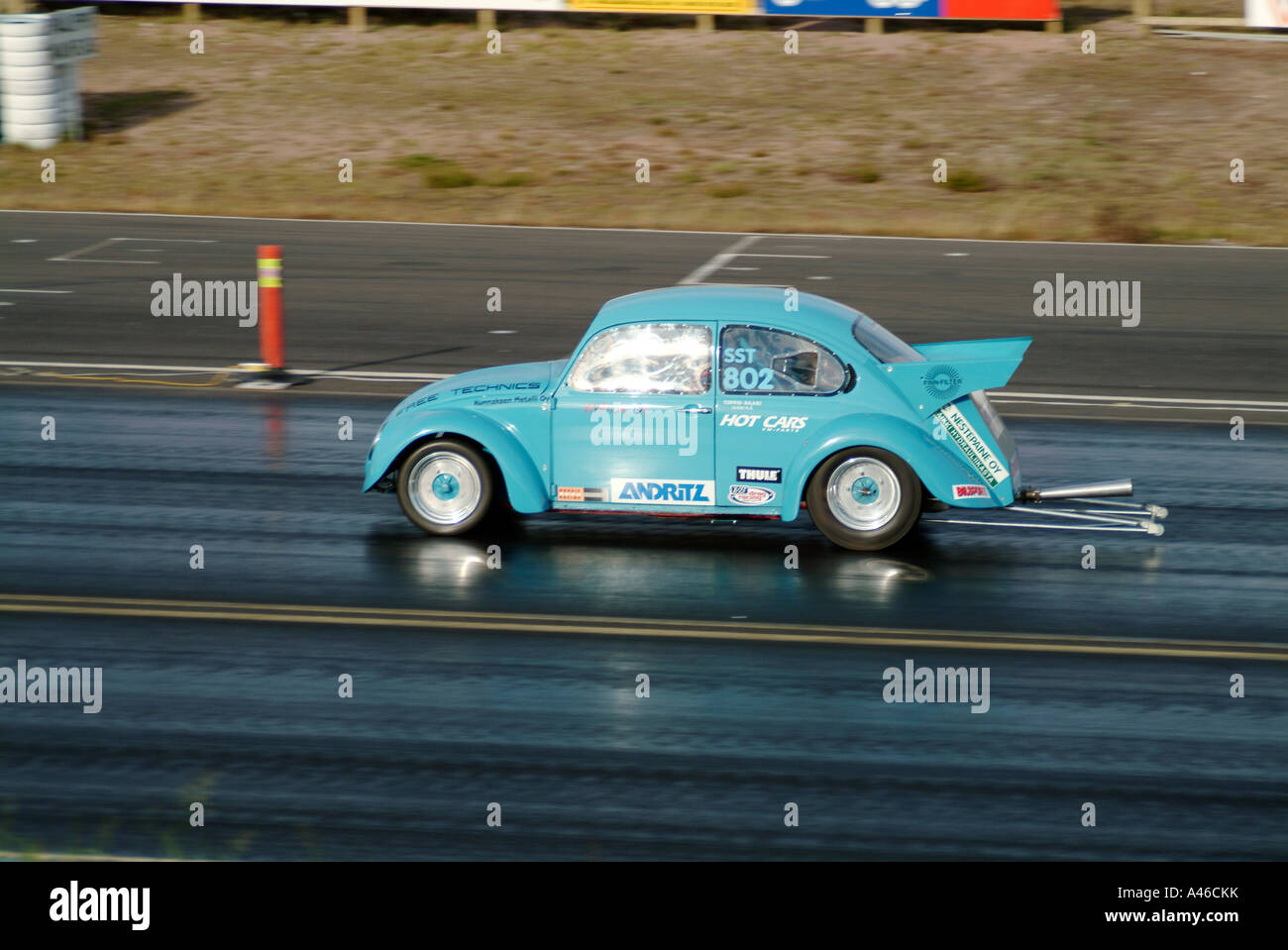 Vw beetle drag car cal look Californian wheelie bar at speed fast Stock ...
