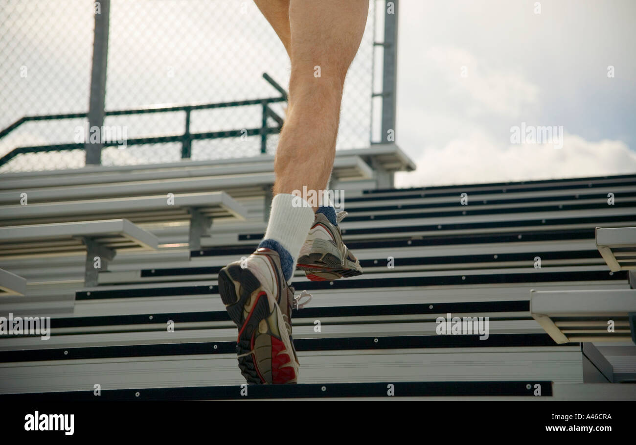 Running up the stairs Stock Photo - Alamy
