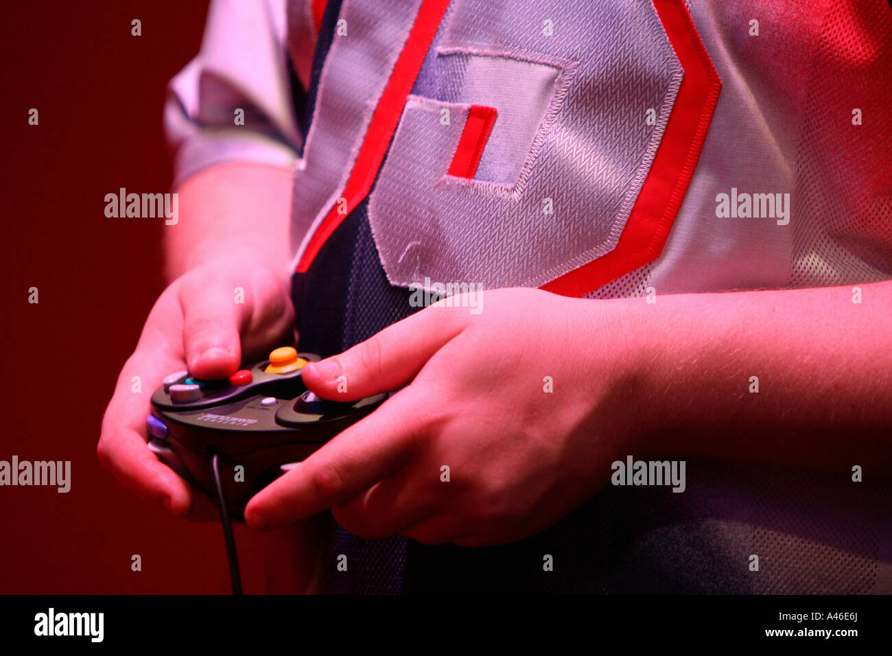 Hands of a human playing a gaming console, Berlin, Germany Stock Photo ...