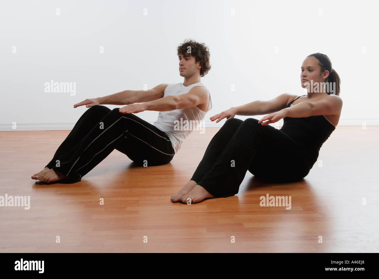 Couple exercising together Stock Photo - Alamy