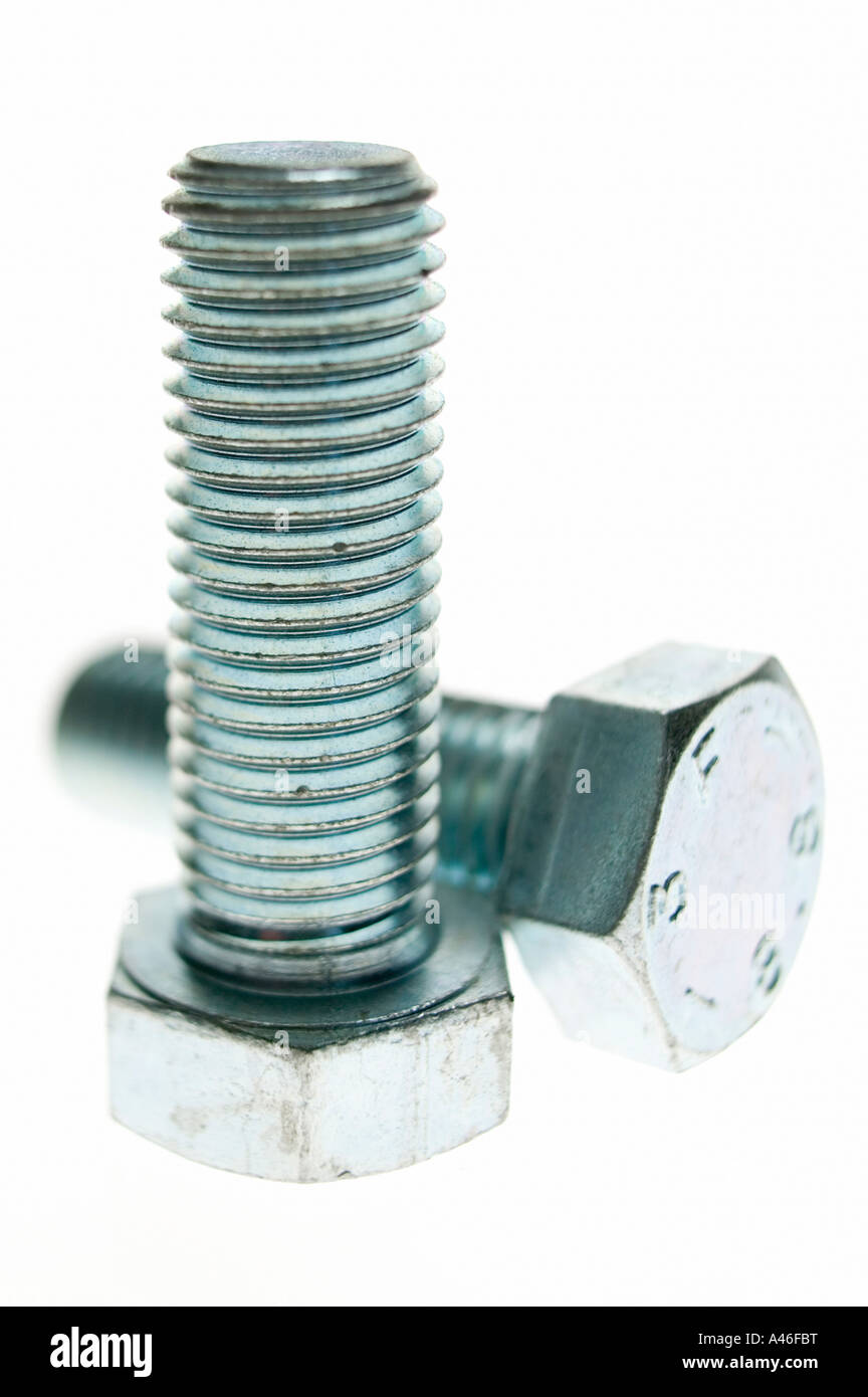 Two screws on white background Stock Photo - Alamy