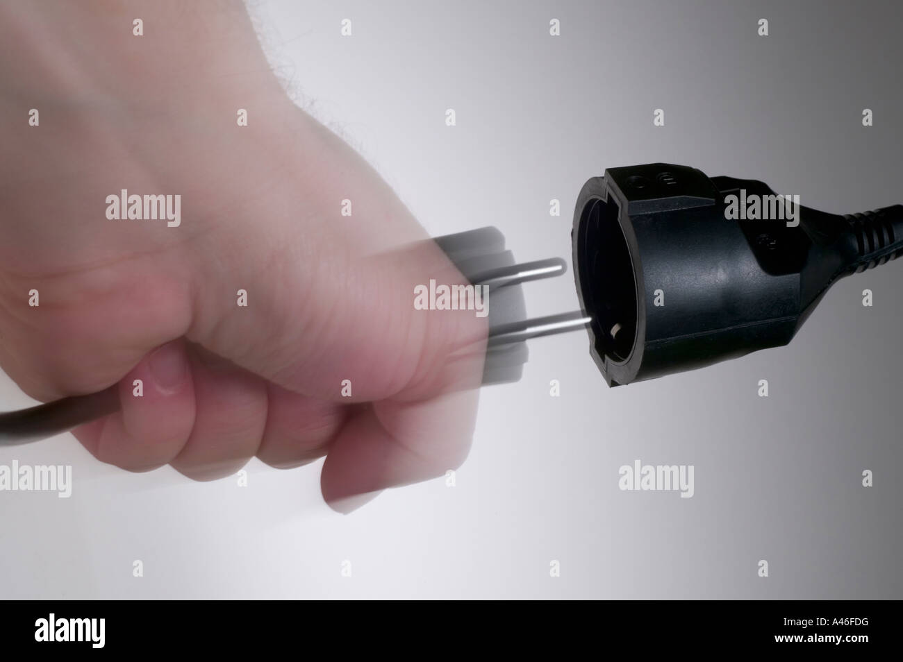 Hand pulling the plug Stock Photo - Alamy